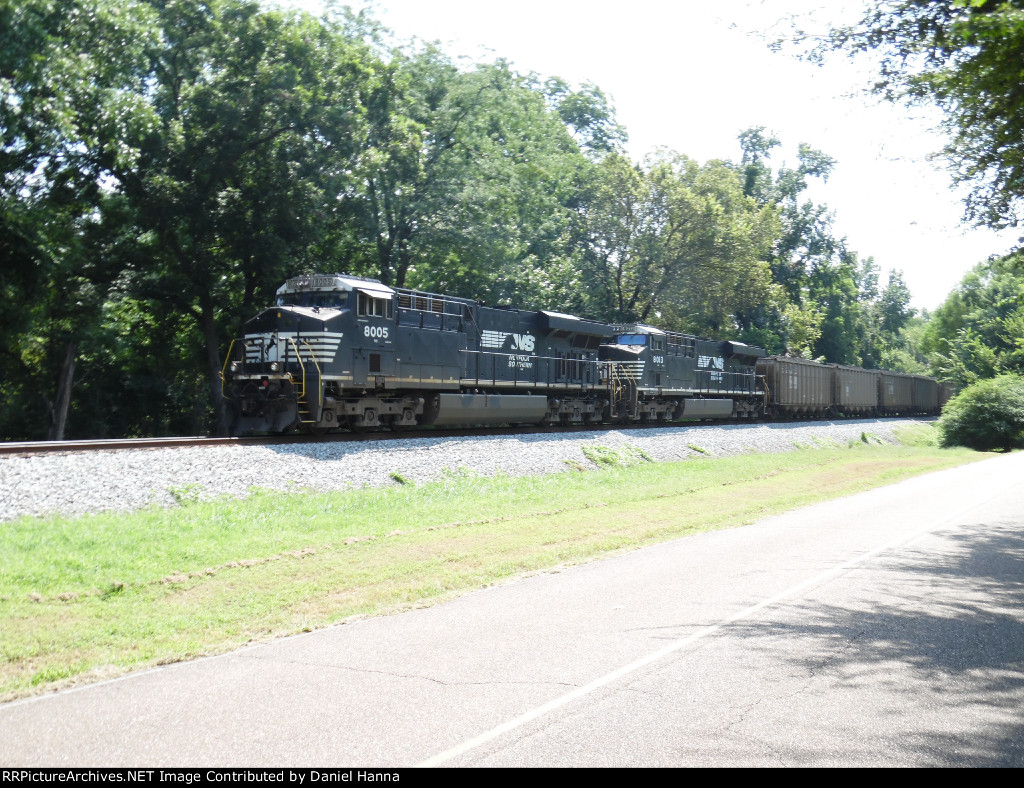 NS 8013 & 8005 push hard on the rear of a loaded coal train